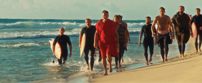 Cowabunga! ‘The Surfer’ is a sunbaked Cage match.