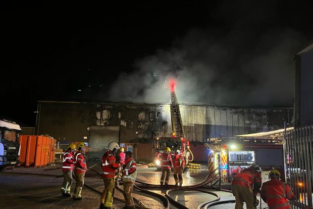 Dramatic pictures show crews at Oldham building fire