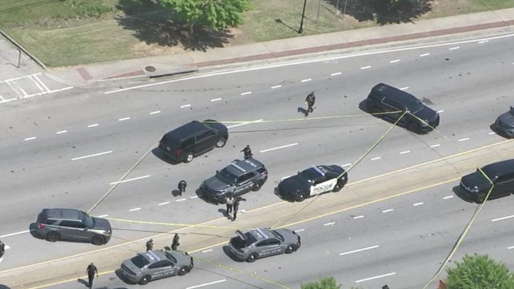 2 officers hurt, suspect dead after shooting along Fulton Industrial ...