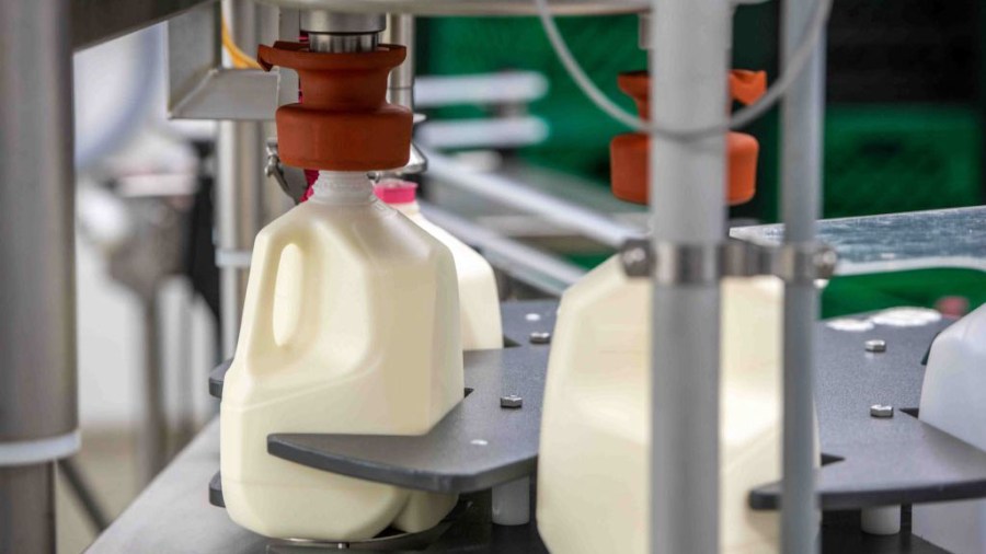 Why do plastic milk jugs have a circular indent on the side?