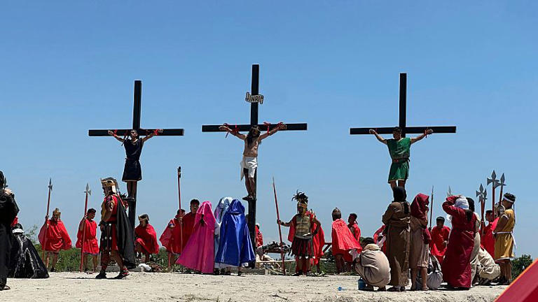 Christians take part in Good Friday processions to mark Christ's ...
