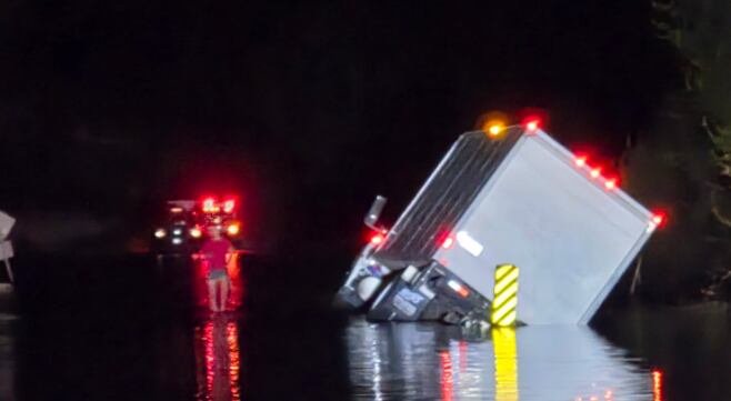 Truck driver ignored signs before getting stranded in flood waters, EMA ...