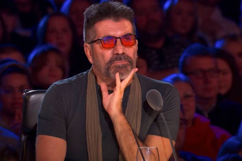 Simon Cowell denies 'fix' as audience member Max Fox bursts on stage in ...