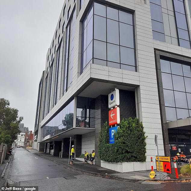 Top surgeon under investigation after tearing down female MP's poster