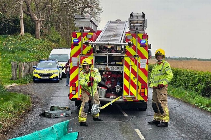 Car 'veers off road and crashes into ditch' as emergency services descend