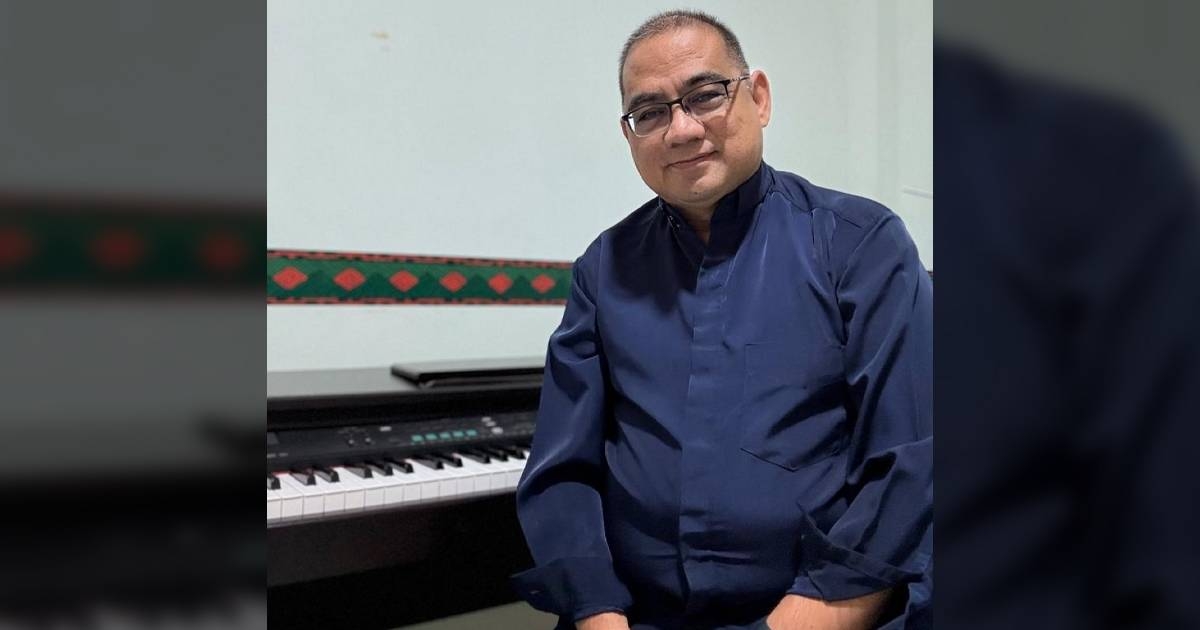 Father Angelo Caparros praises God through music