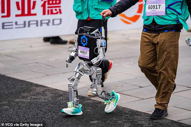 Robots race against human runners in half-marathon in China