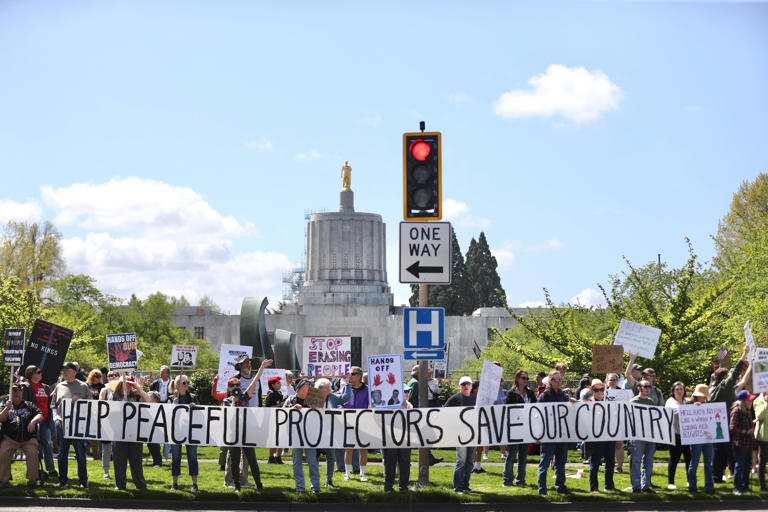 Rise & Resist protesters rally against President Donald Trump at Oregon ...