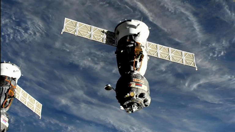 NASA's most senior astronaut returns to Earth with 2 cosmonauts