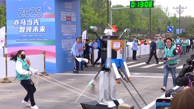 Chaos at China's man vs machine race as robots fail to finish