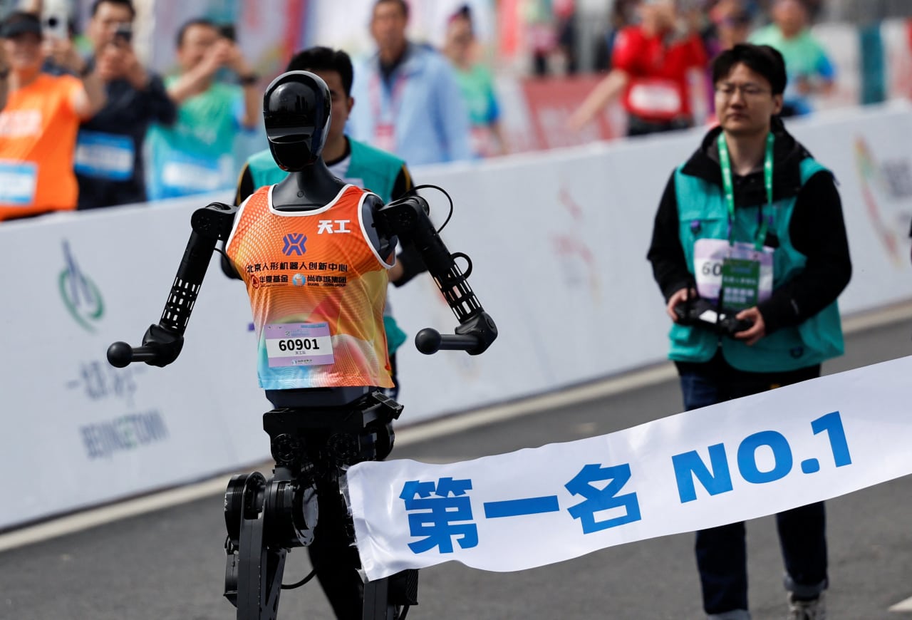 Man Versus Machine as China Shows Off Humanoid Robots in Half-Marathon