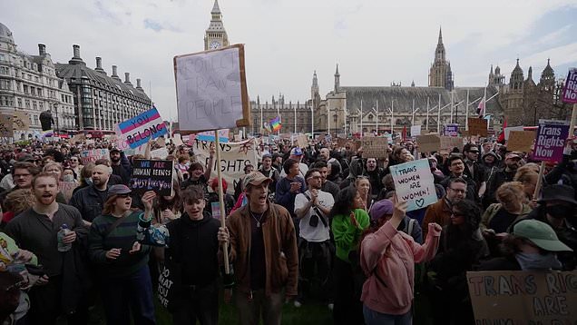 Thousands march in protest at Supreme Court ruling on definition of a woman