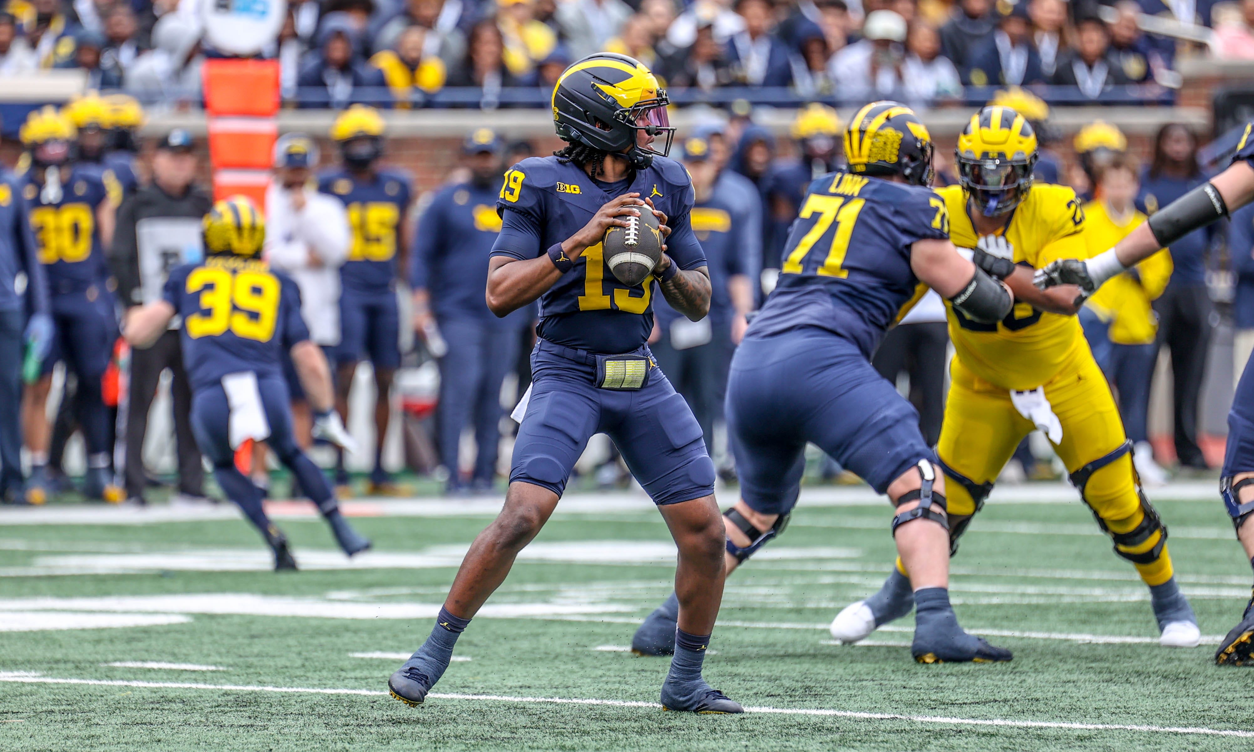 EA Sports College Football 26 cover features Michigan's Bryce Underwood ...