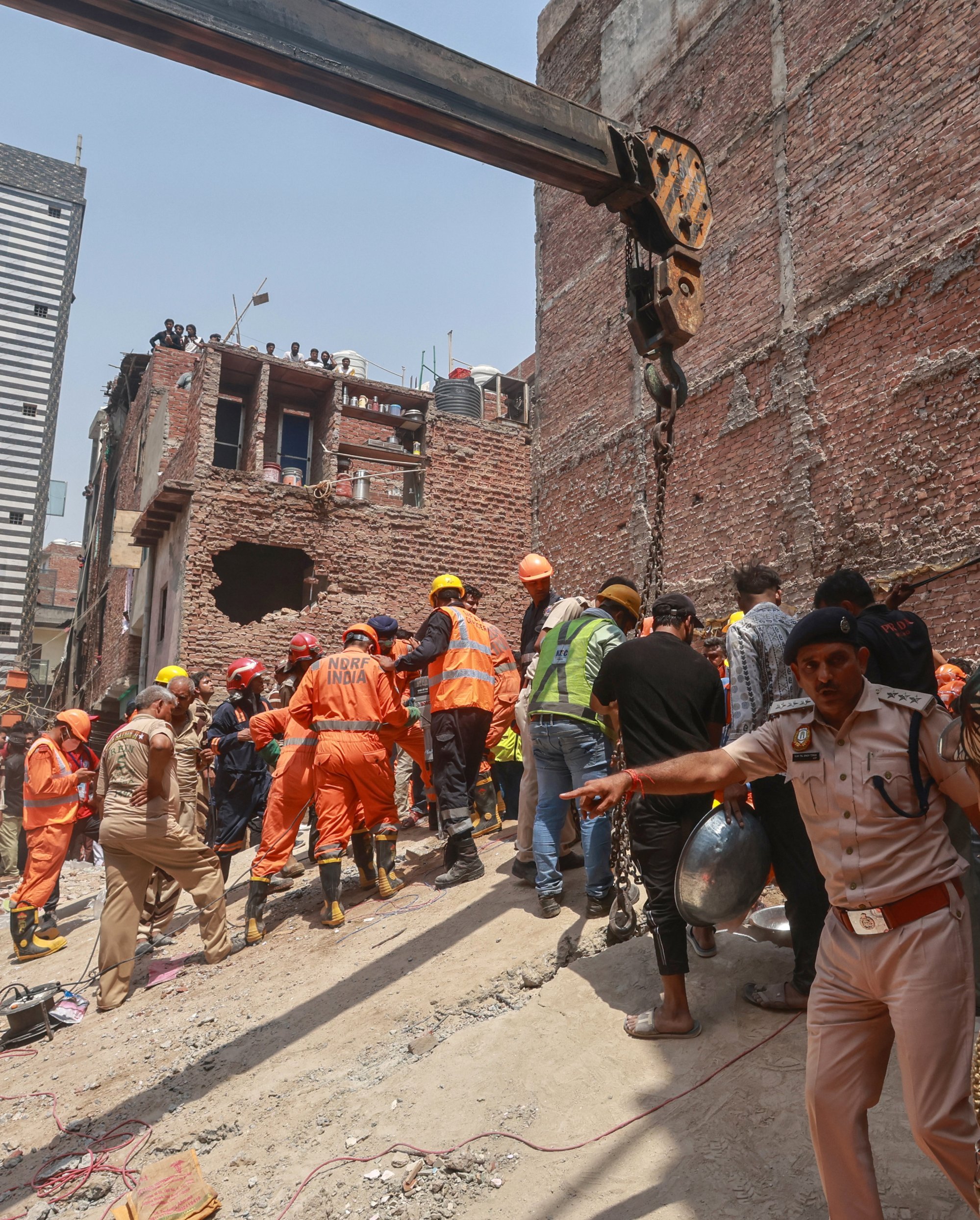 Indian building collapse kills at least 11, highlighting safety concerns