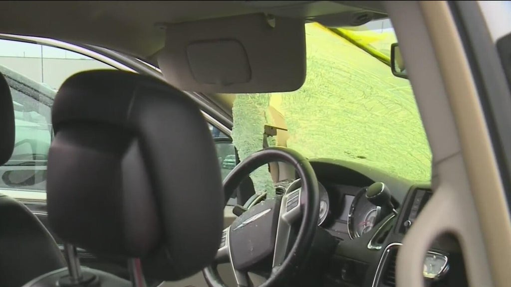 Woman reports injury after mysterious object smashes through windshield ...