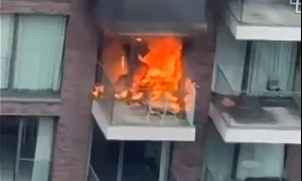 Around 100 firefighters called to fire at block of luxury London flats