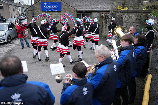 Controversial group of Morris dancers 'black up' for the Easter parade