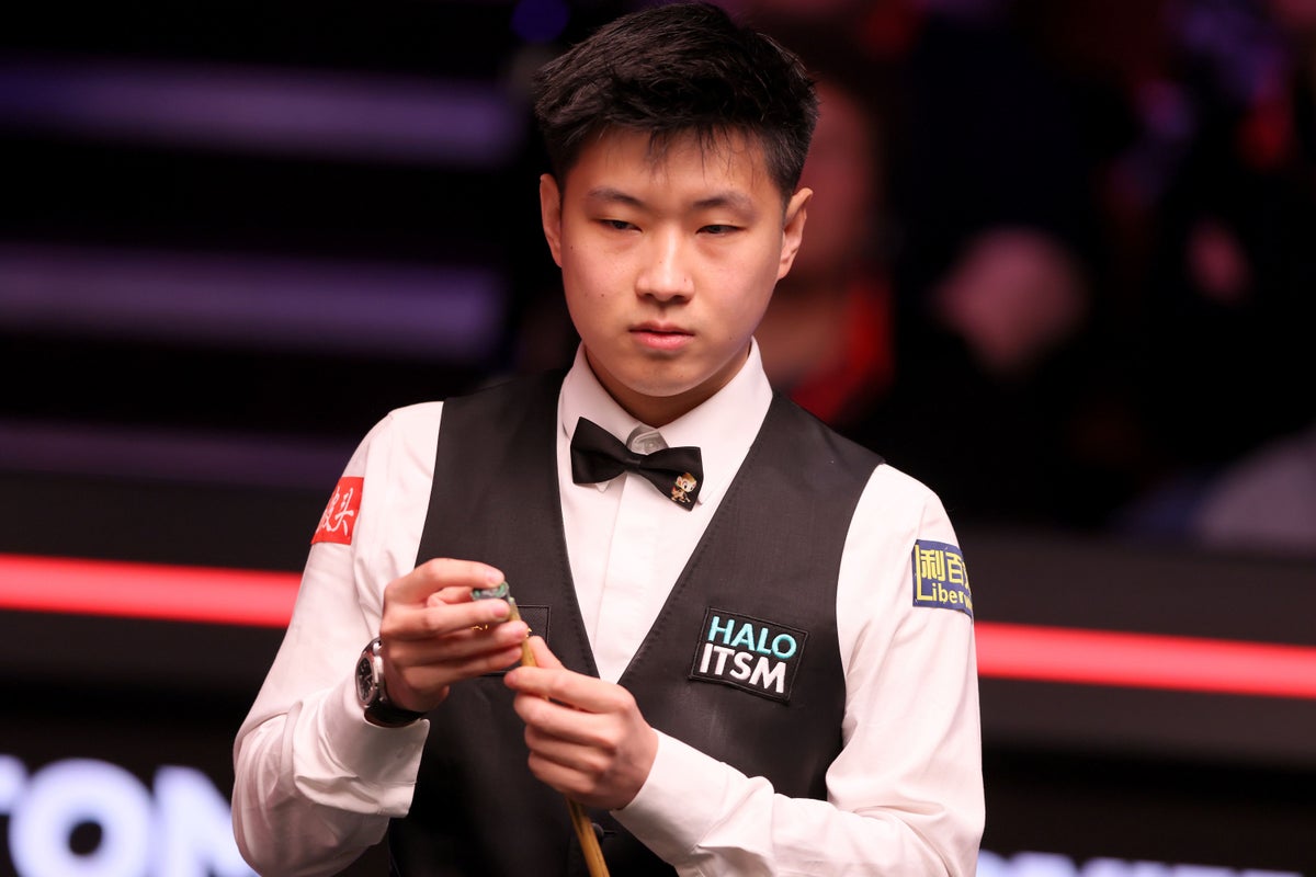Xiao Guodong and Zhao Xintong continue Chinese charge at World Championship