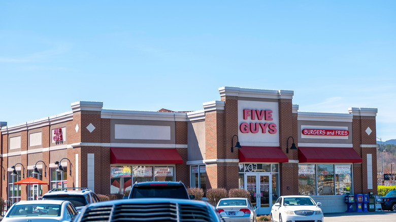 The Famous Golfer Who Owns Five Guys Franchises In California