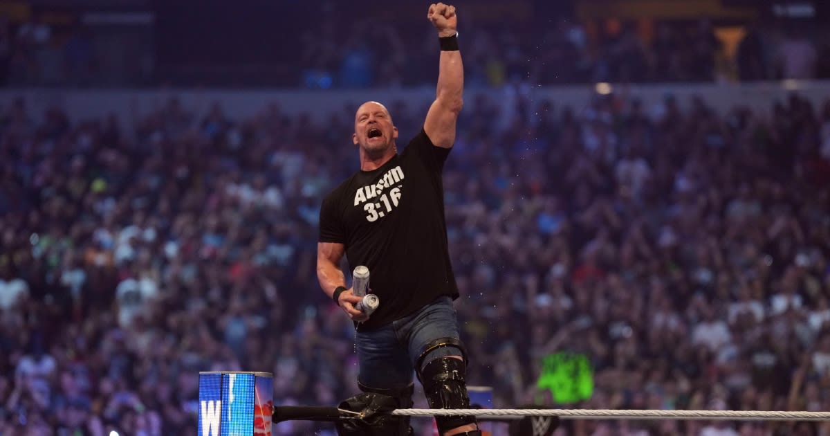 ‘Stone Cold’ Steve Austin crashes ATV into barrier at WrestleMania, fan ...