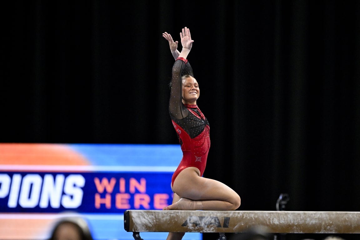 Stunning photos of elite college women's gymnastics beam routines