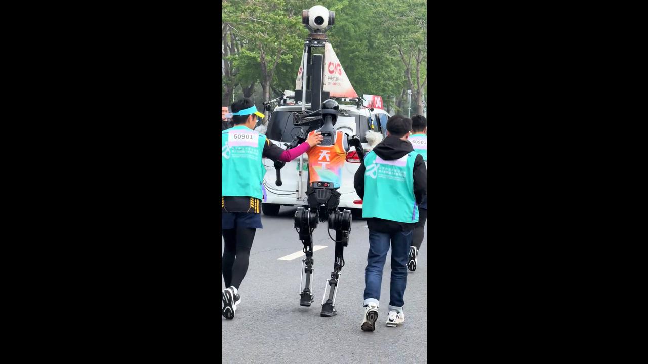 Robots participate in world's first humanoid half-marathon in China