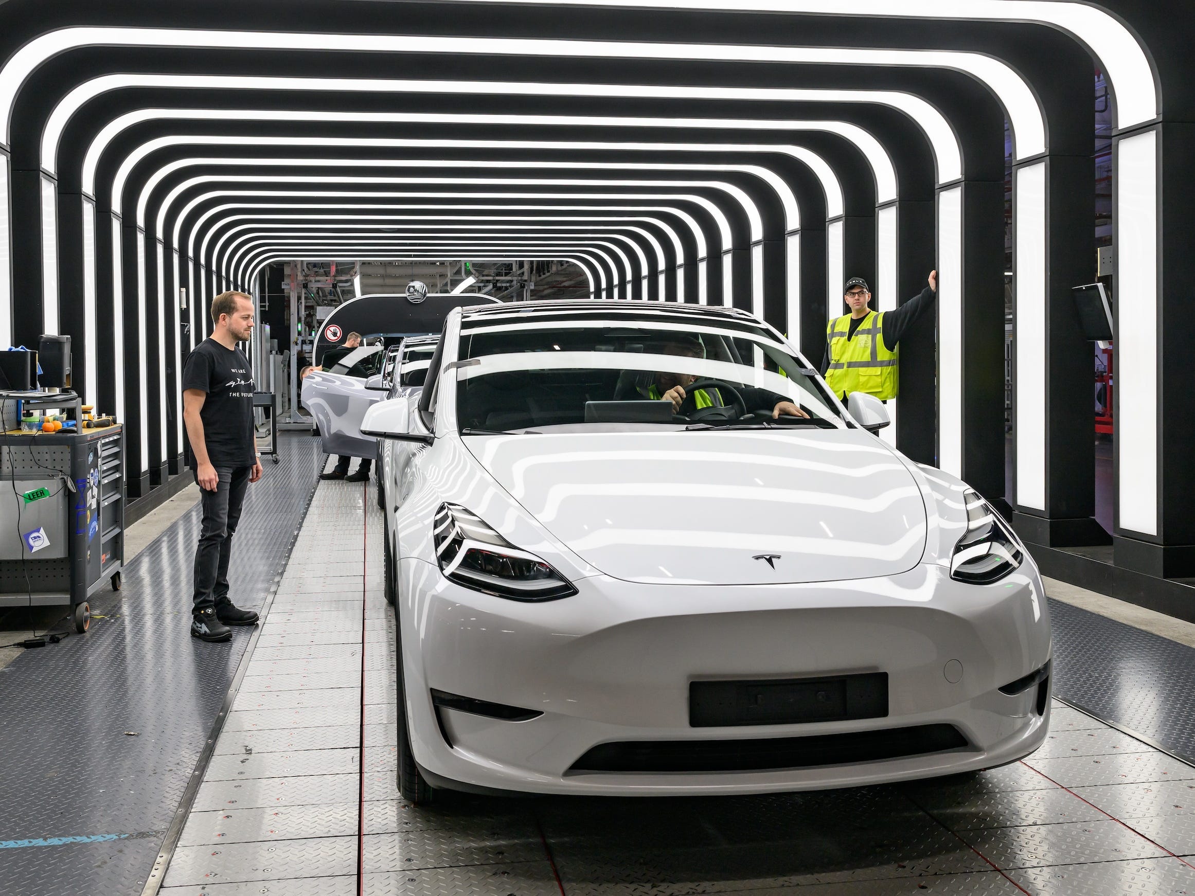 Tesla stock drops after a report says its low-cost vehicle will be ...