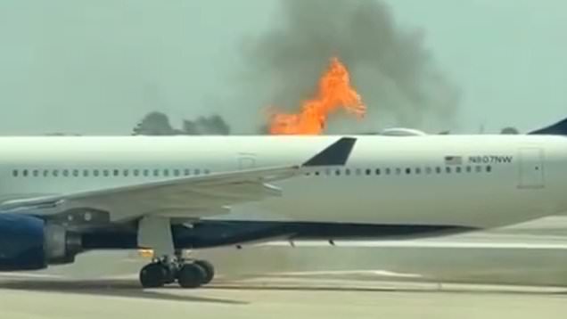 Delta flight passengers evacuated on runway after Boeing plane catches fire