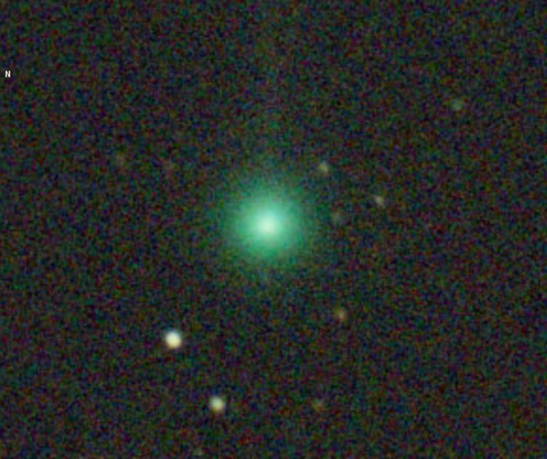 A green comet likely is breaking apart and won't be visible to the naked eye