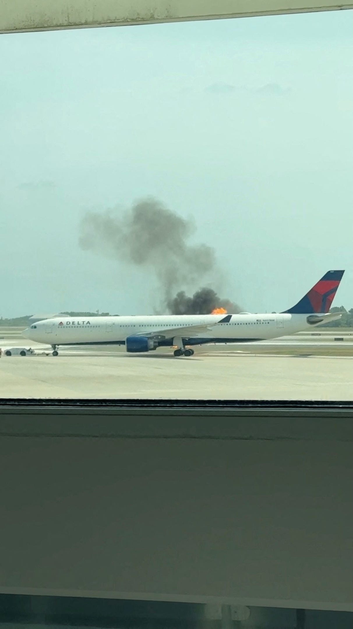 'I heard people yell fire': Delta flight evacuated after engine sparks