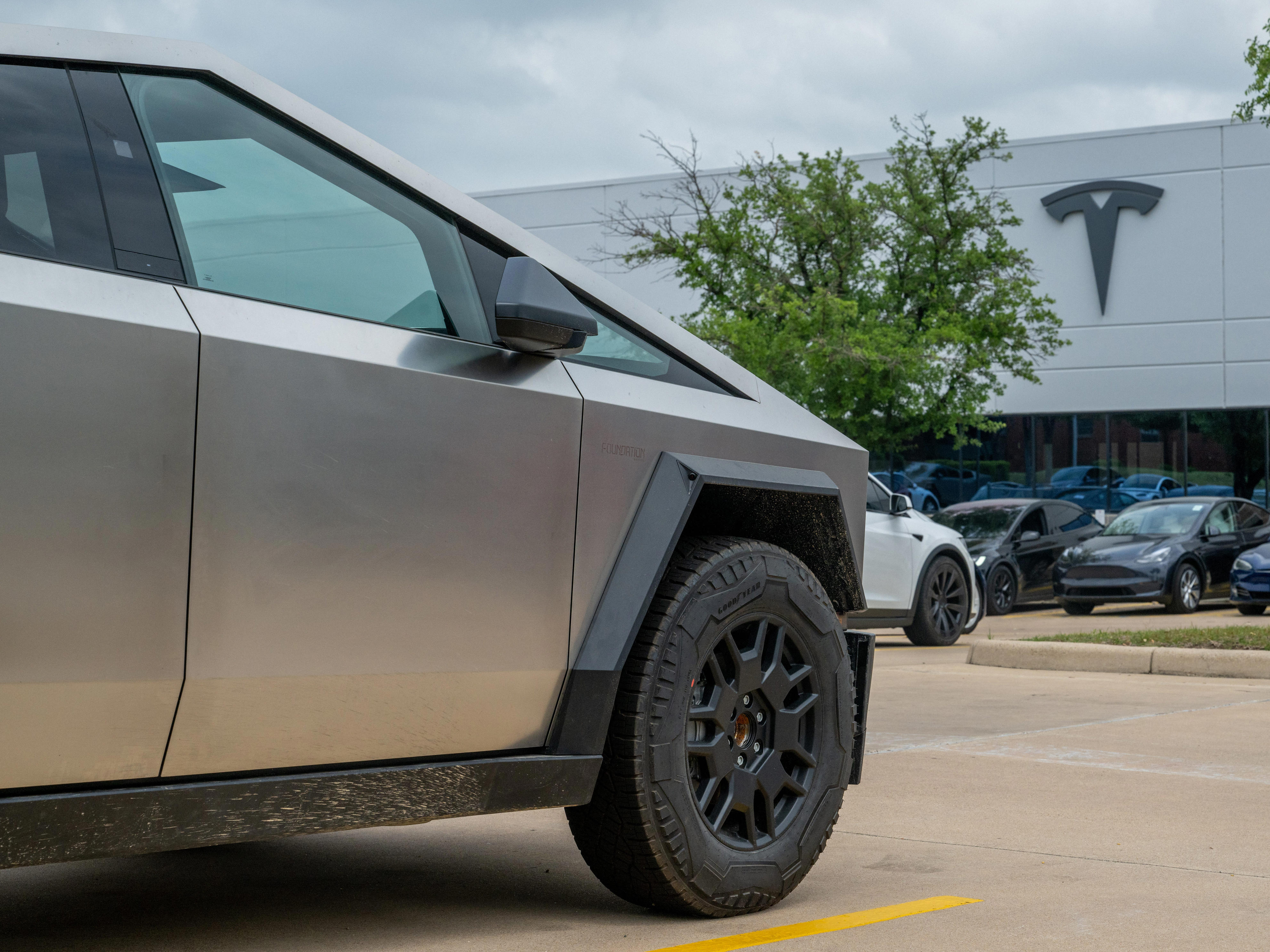 Wall Street is bracing for Tesla earnings pain after the EV-maker's ...