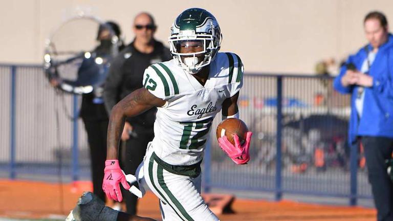 Travis Hunter was a two-way high school football star for Collins Hill ...