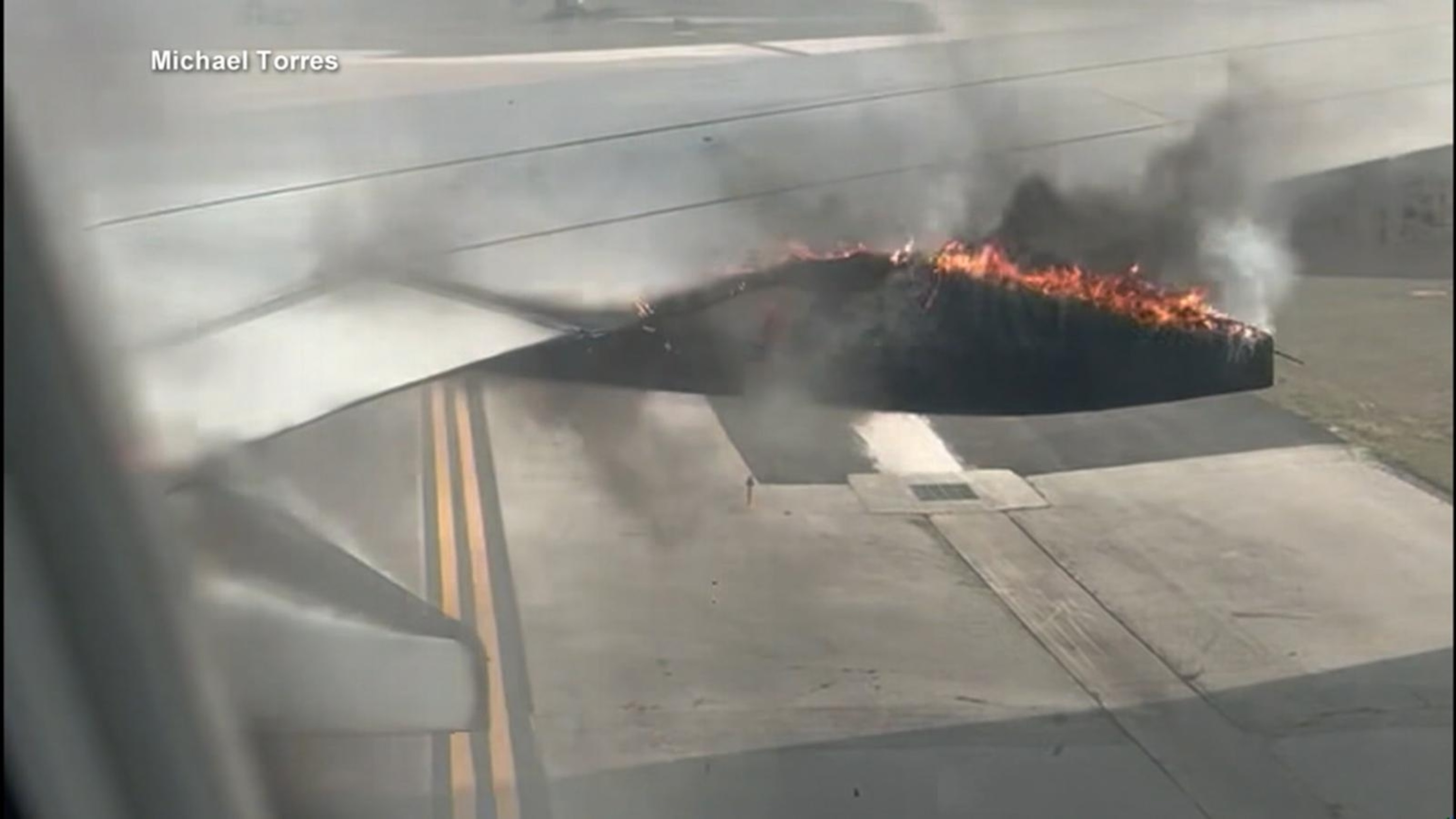 Nearly 300 people evacuated from Delta plane after engine fire