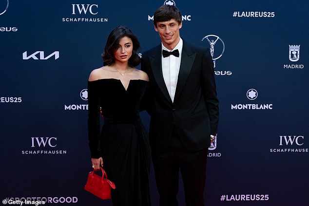 Spain love triangle footballer makes red carpet debut with stunning new girlfriend as he tries ...