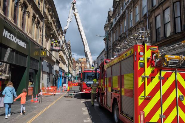 Loose glass prompts major emergency services presence and cordon on ...