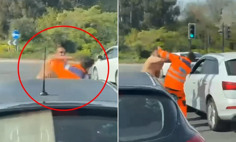 Moment road rage motorist throws punch at recovery truck driver in ...