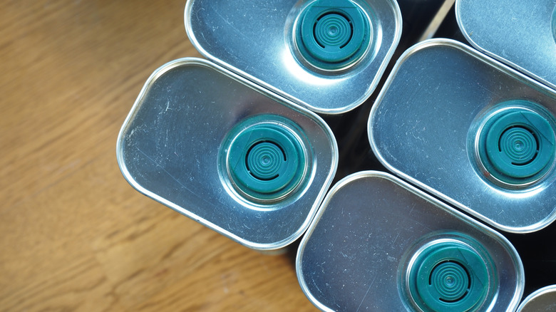 Declutter Your Space And Recycle Old Tins With This Smart DIY