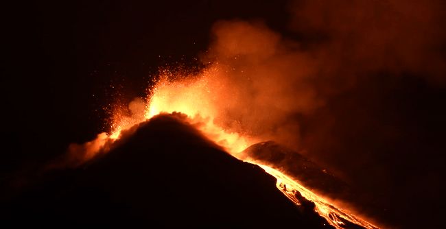 Incandescent Lava Flows Down Mount Etna Following Eruption