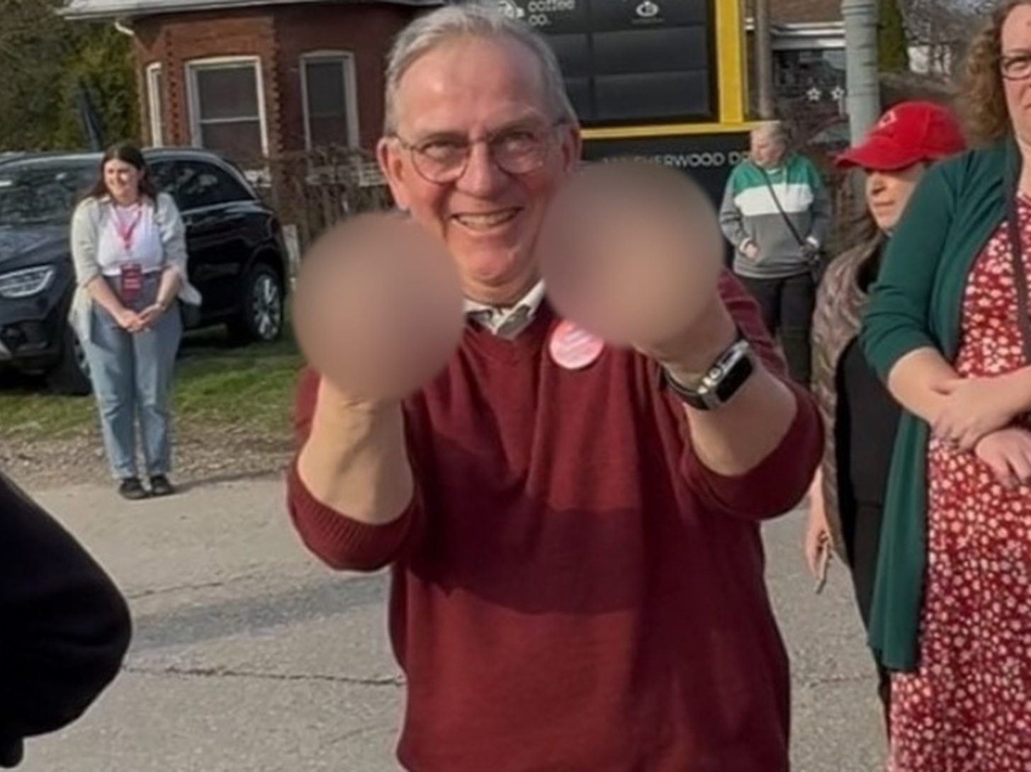 Grinning Carney supporter gives two middle fingers in defining election ...