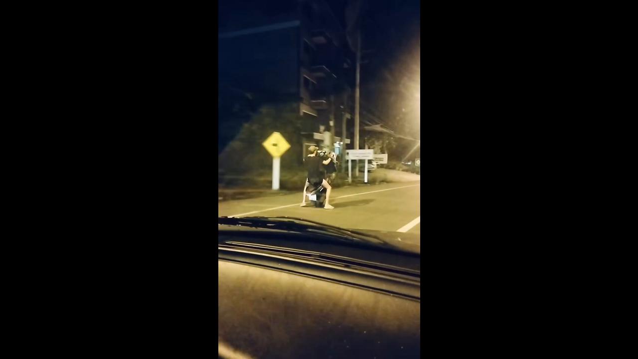 Shocking moment tourist does motorcycle wheelie on road