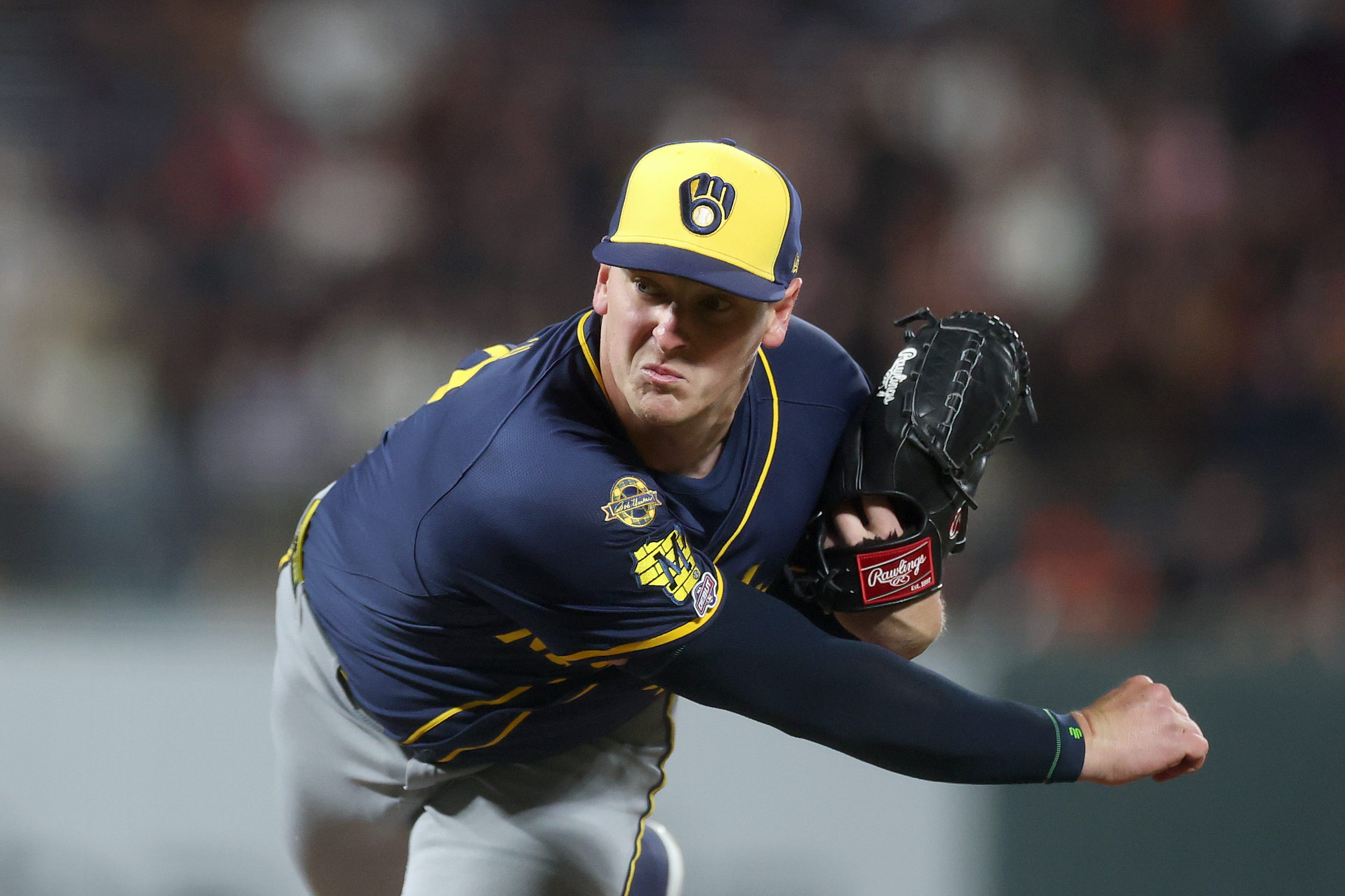 What makes new Milwaukee Brewers relief pitcher Craig Yoho so interesting?
