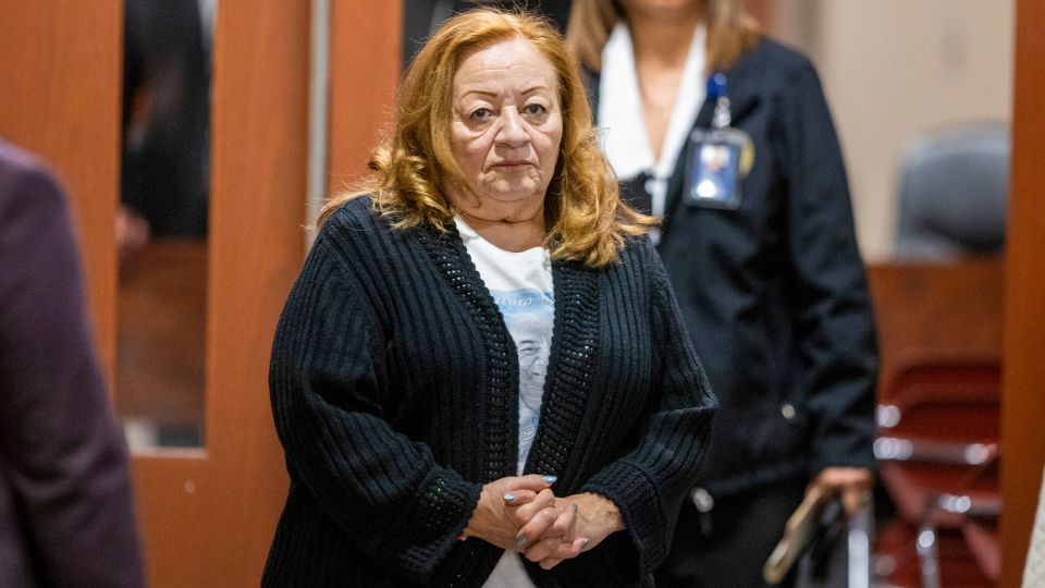 A woman hugs the man who fatally shot her brother and 22 more in a ...