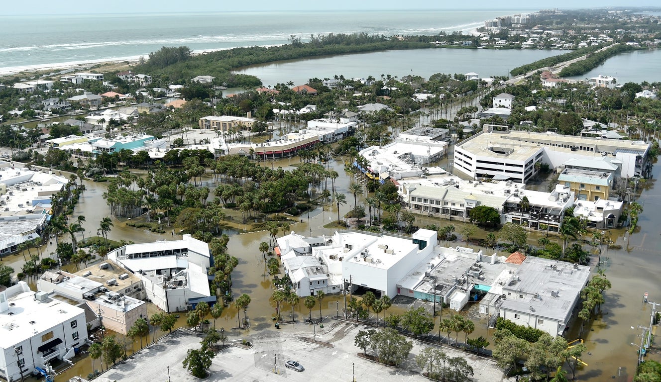 Incredible aerial photos show massive damage from hurricanes last fall