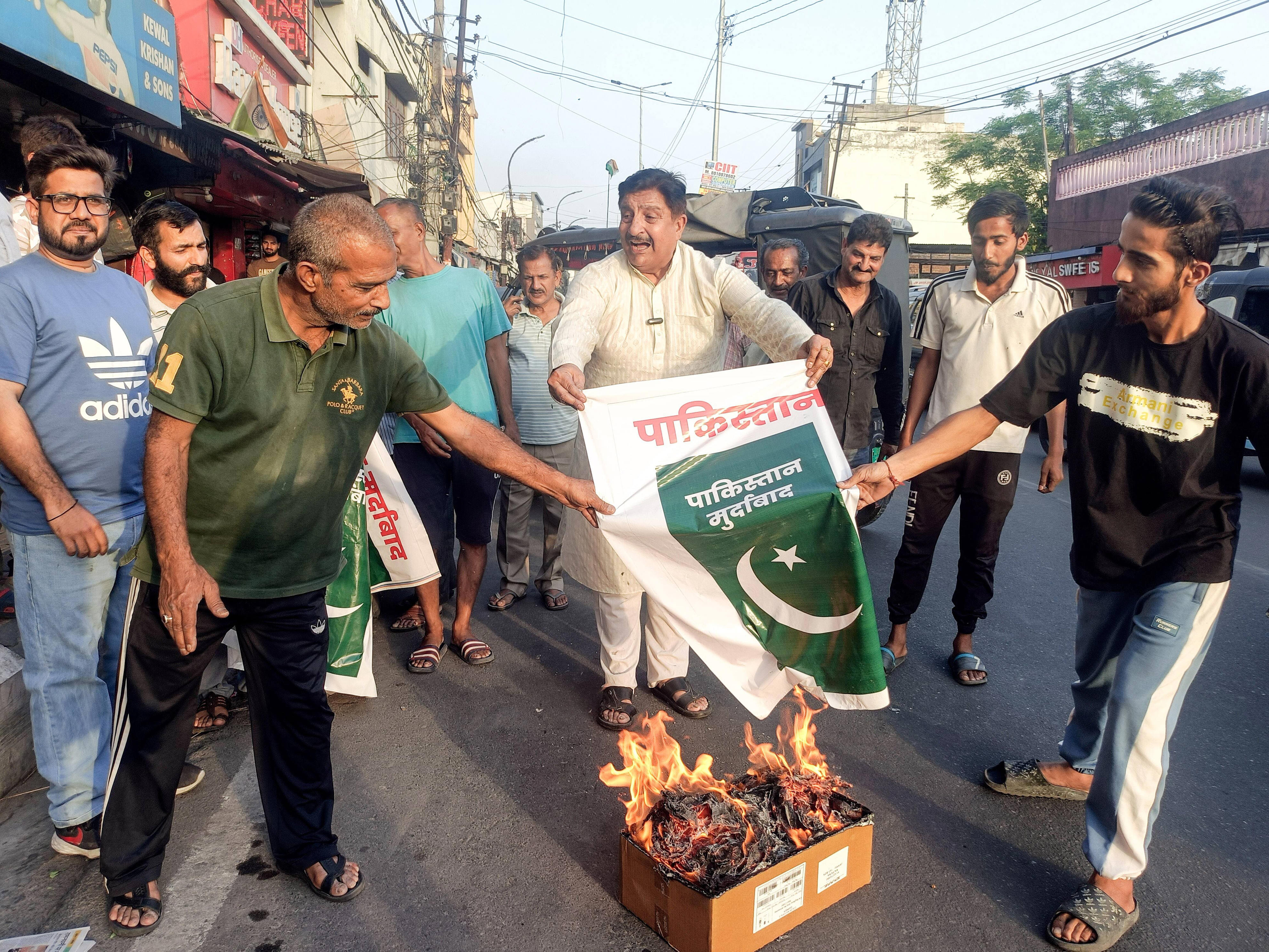 Pakistan flag burnt, slogans raised in protest as anger flares in ...