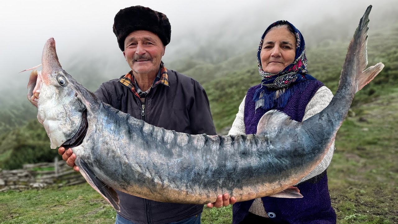 Cooking a Giant Fish Head Soup Over Open Fire