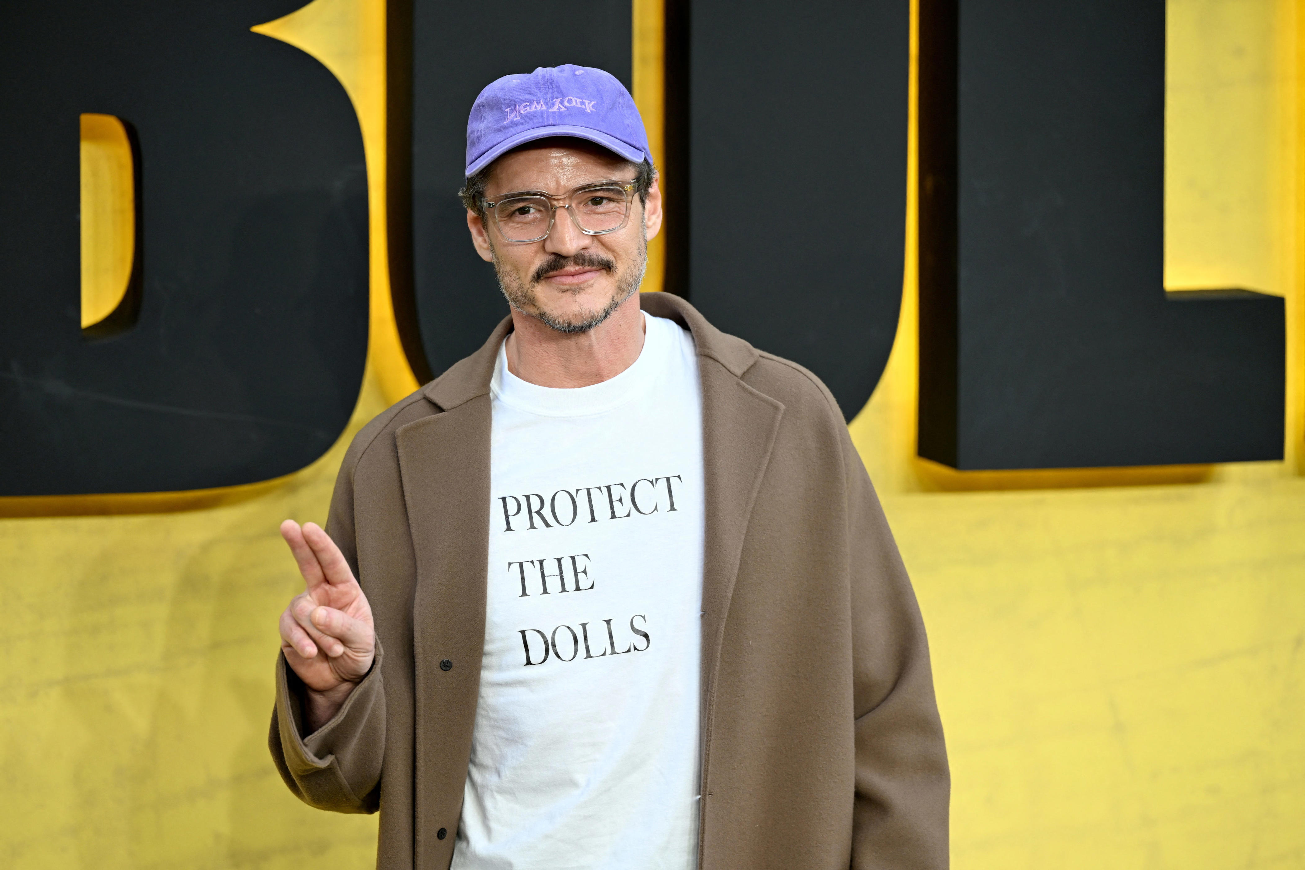 Pedro Pascal wears 'protect the dolls' shirt at 'Thunderbolts' red carpet