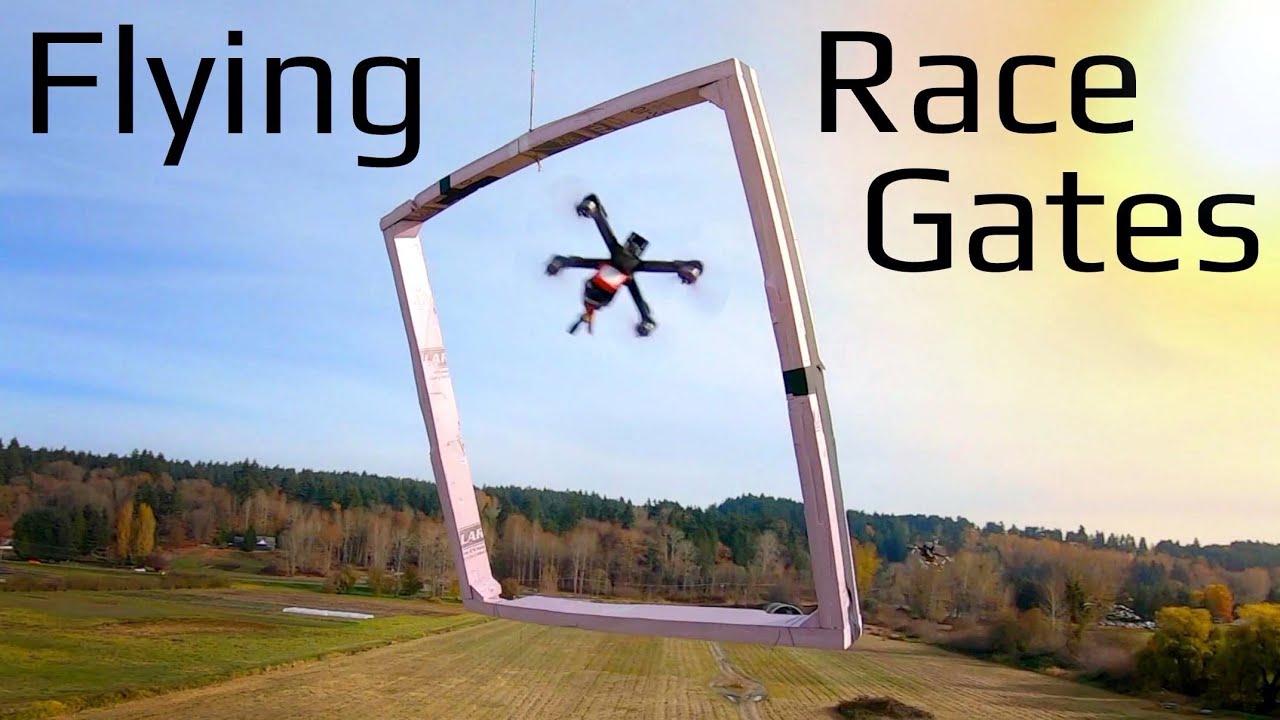 Floating FPV Race Gates Under Huge Drone