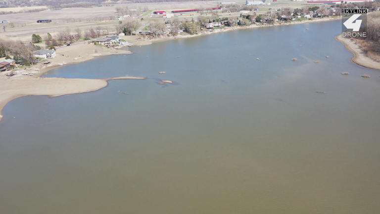 A car, chunks of homes washed away in the flood, visible on first boat tour of McCook Lake