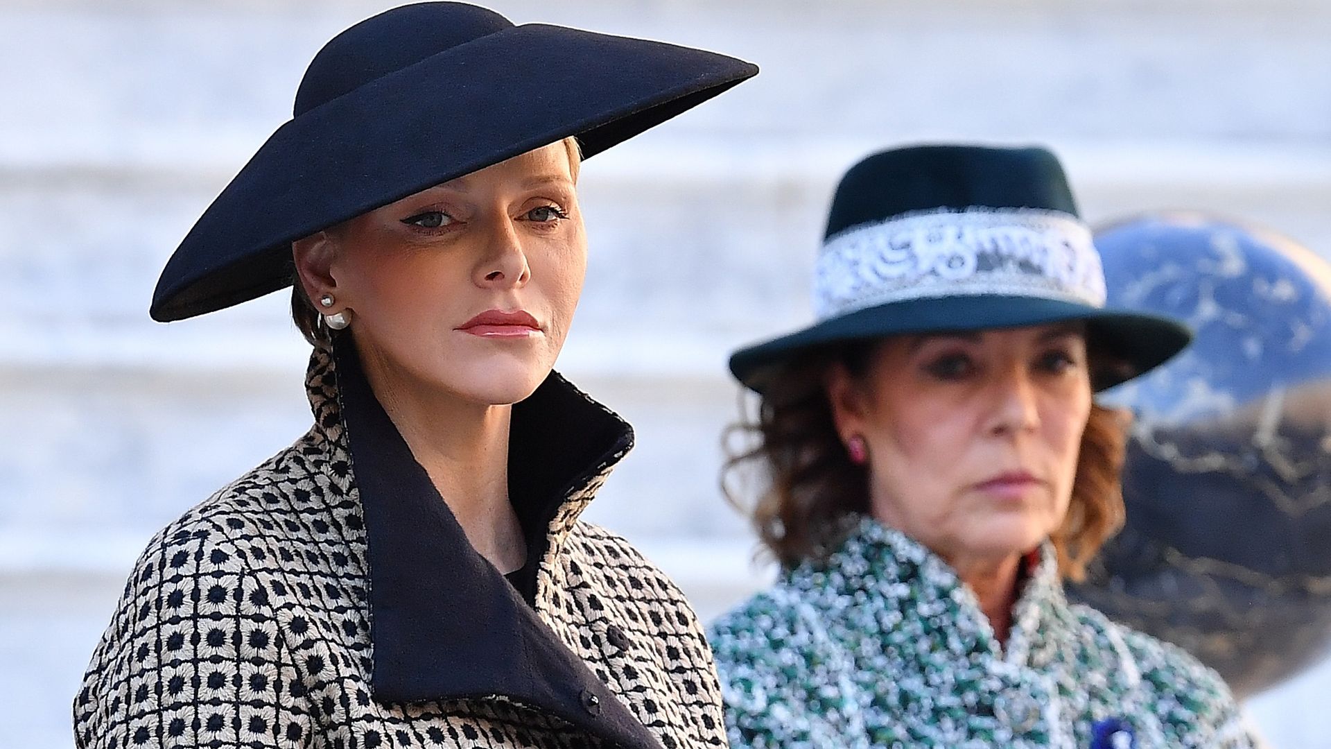 Sisters-in-law Princess Caroline and Princess Charlene pay their ...