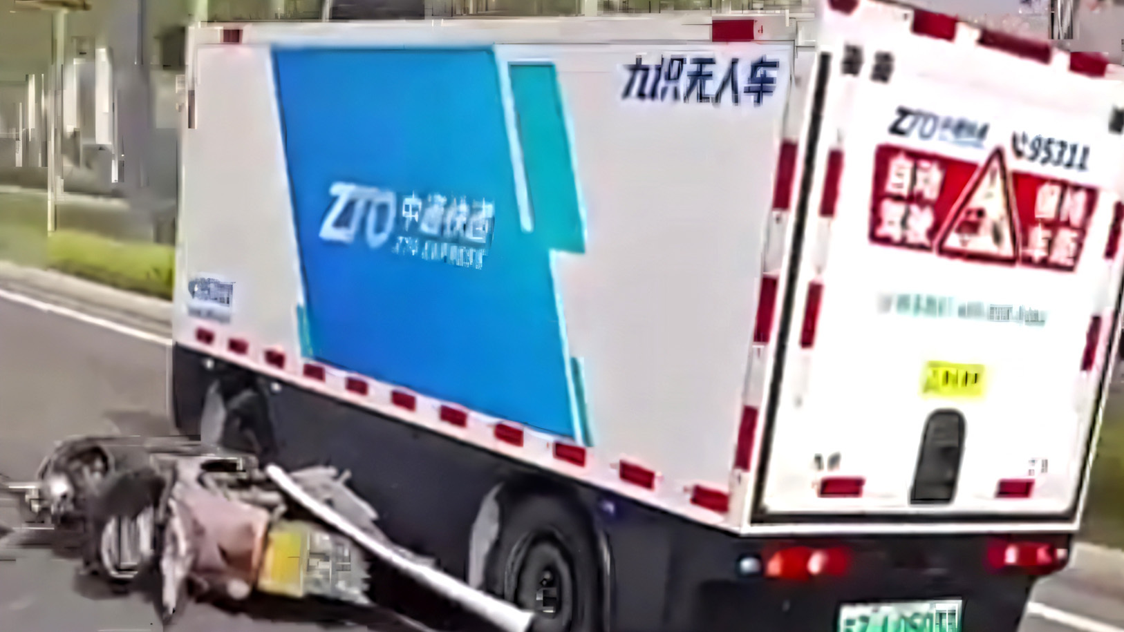 Self-Driving Delivery Van Drags Scooter After AI Malfunction